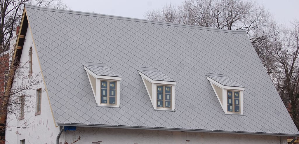 zinc-shingle-saddle-roof - Spengler Industries