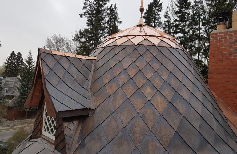 Copper shingles on turret with dormer - Spengler Industries